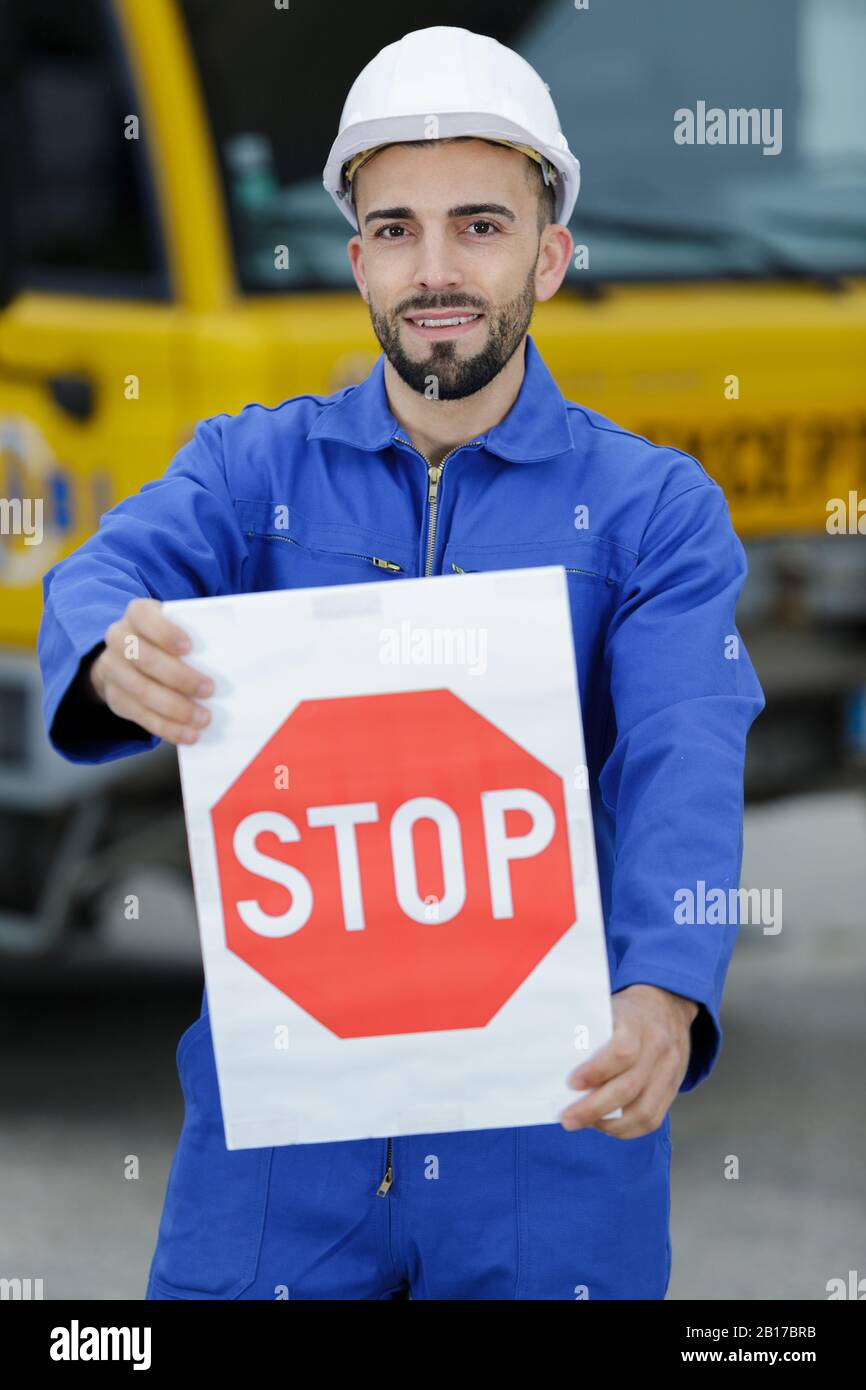 Man holding stop signal hi-res stock photography and images - Alamy