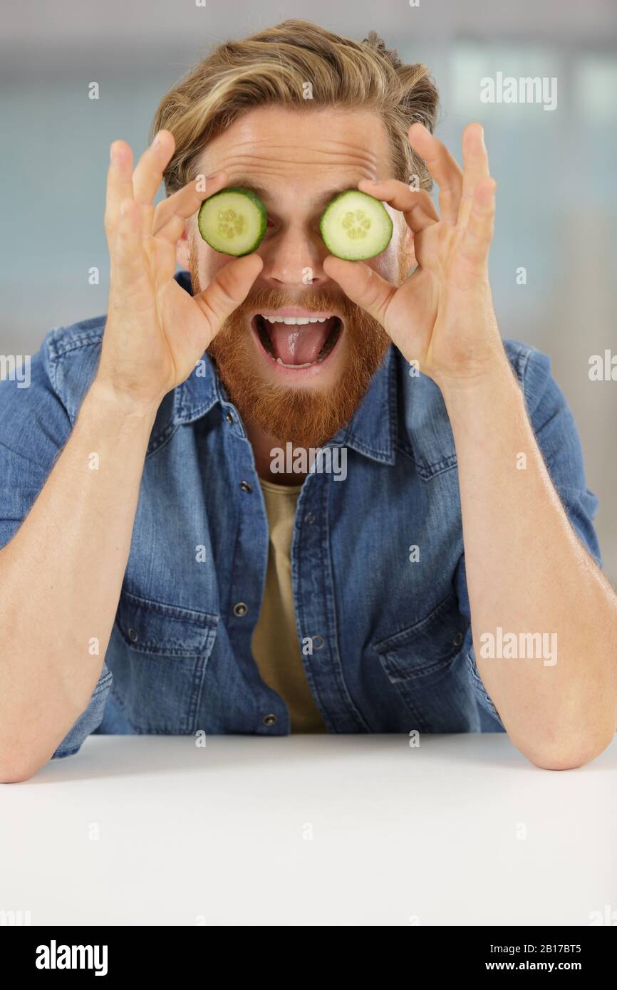 Man Eating Cucumber Spa Eye