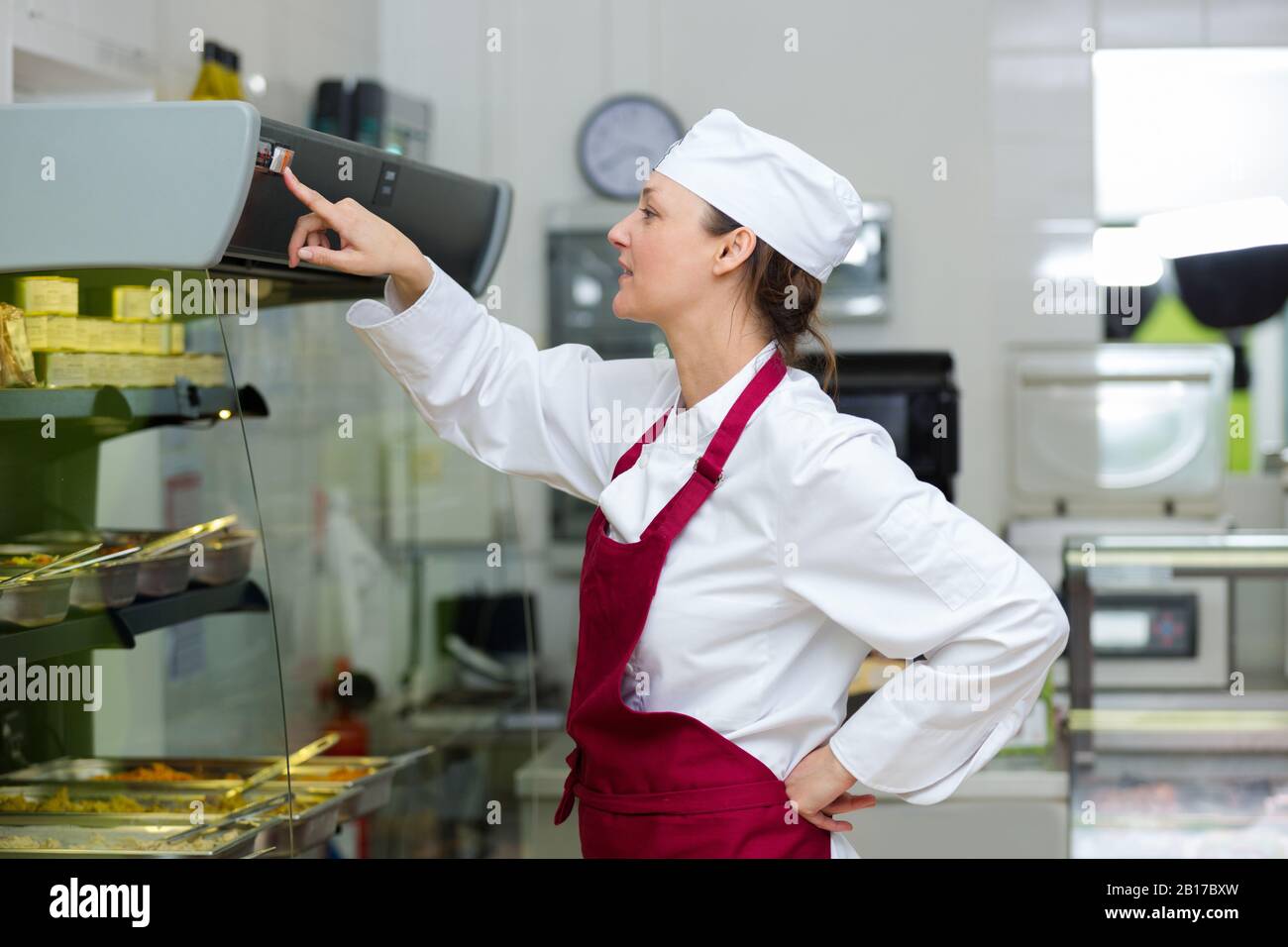 Festive buffet food woman hi-res stock photography and images - Alamy