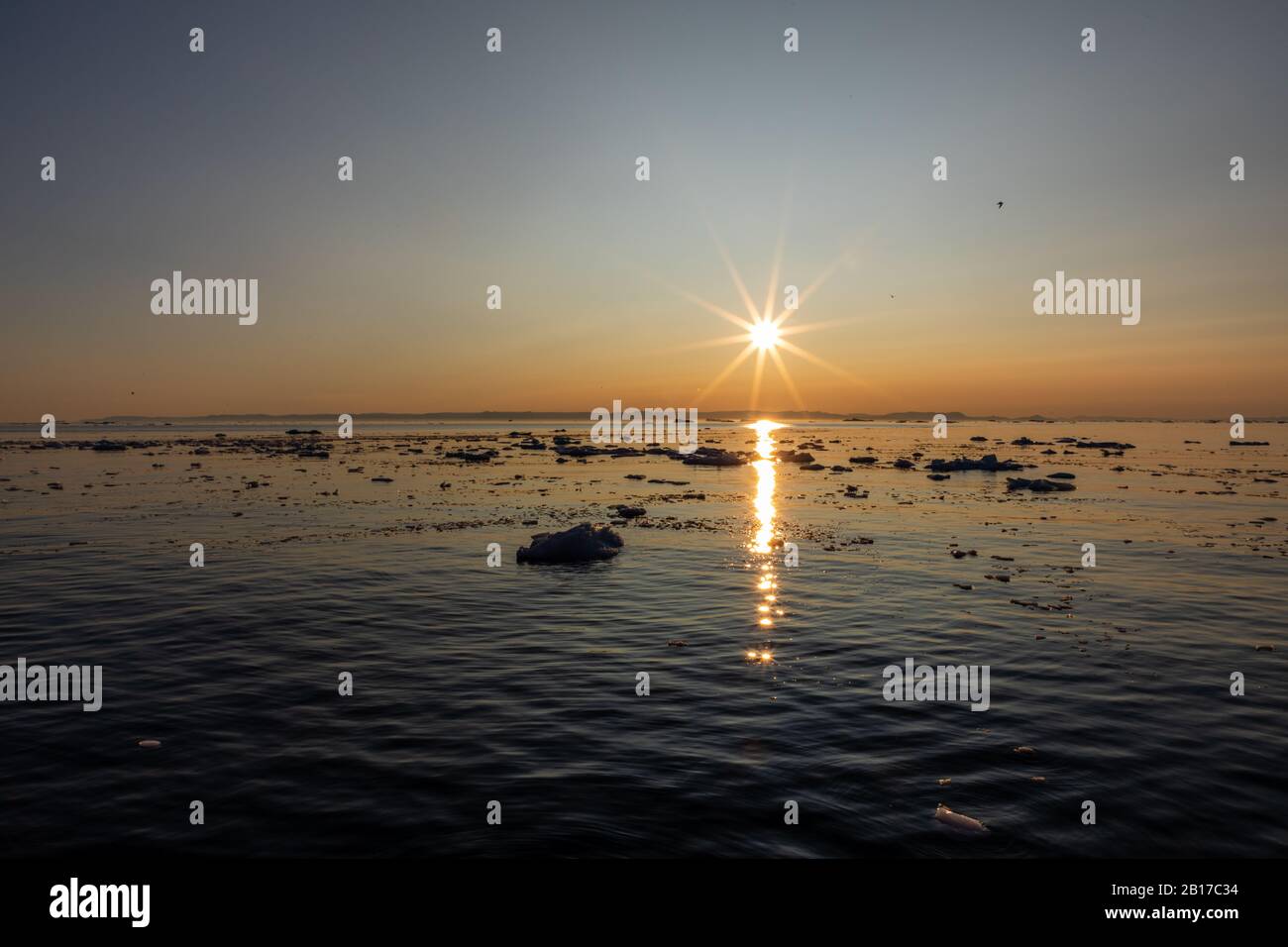 Floating icebergs in Disko Bay during the midnight sun, Greenland Stock ...