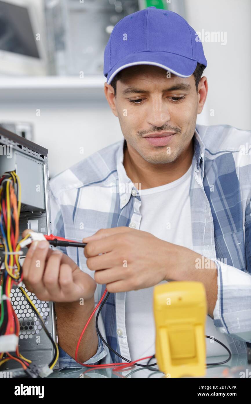 technician man checking electrical terminal box Stock Photo - Alamy