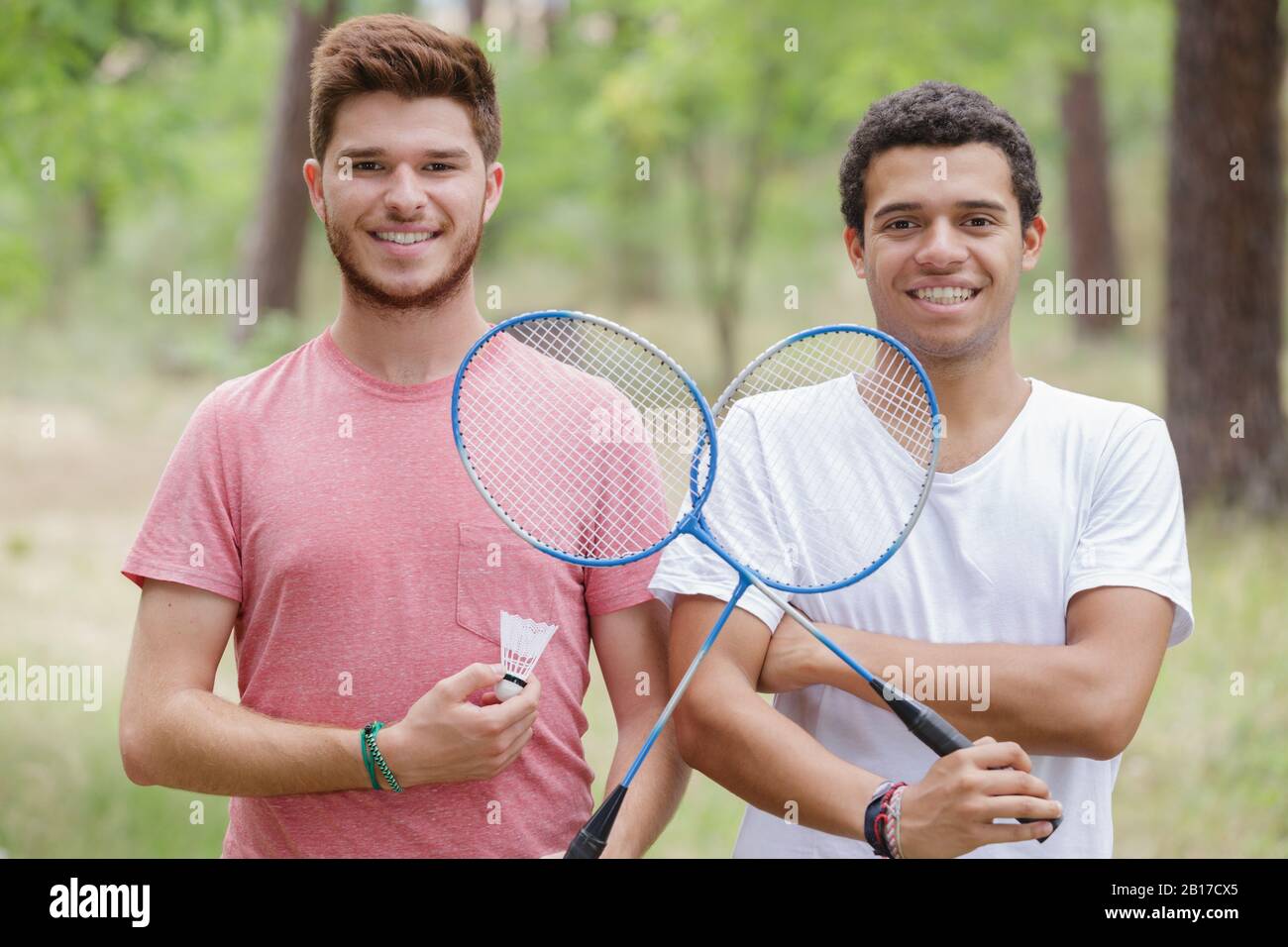 two men are playing badminton Stock Photo - Alamy