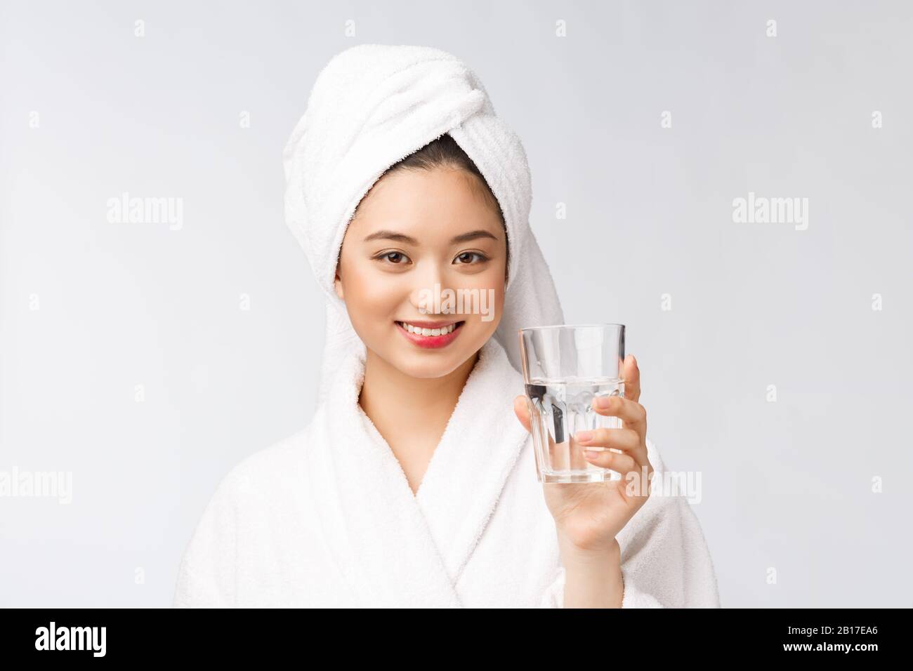 Healthy young beautiful woman drinking water, beauty face natural ...