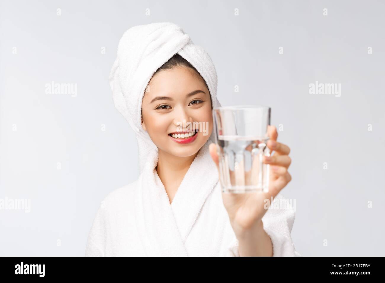 Healthy young beautiful woman drinking water, beauty face natural ...