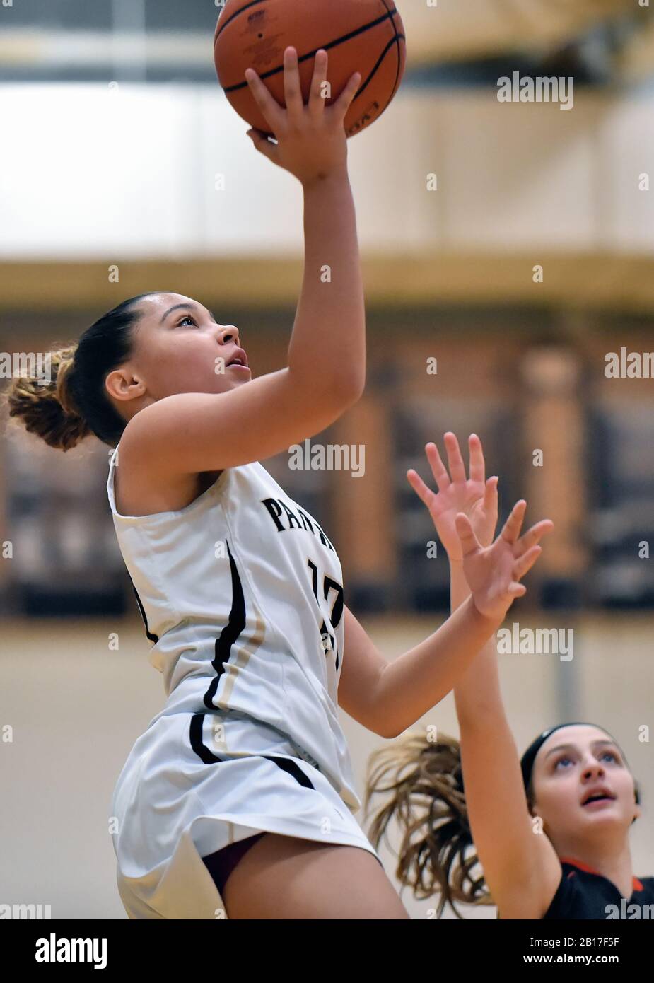 Female Basketball Player Shooting