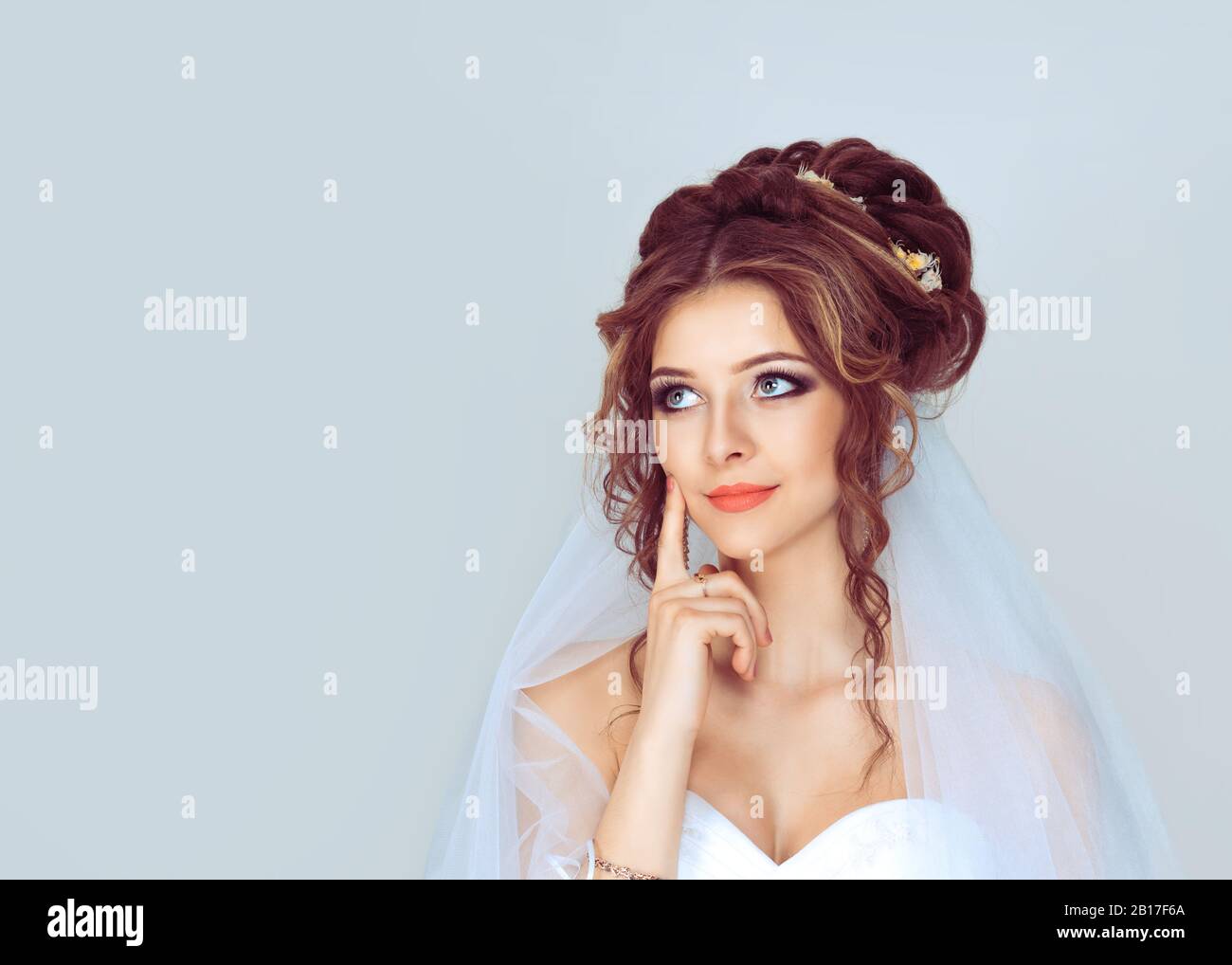 Bride thinking. Closeup portrait head shot happy mixed race daydreaming ...