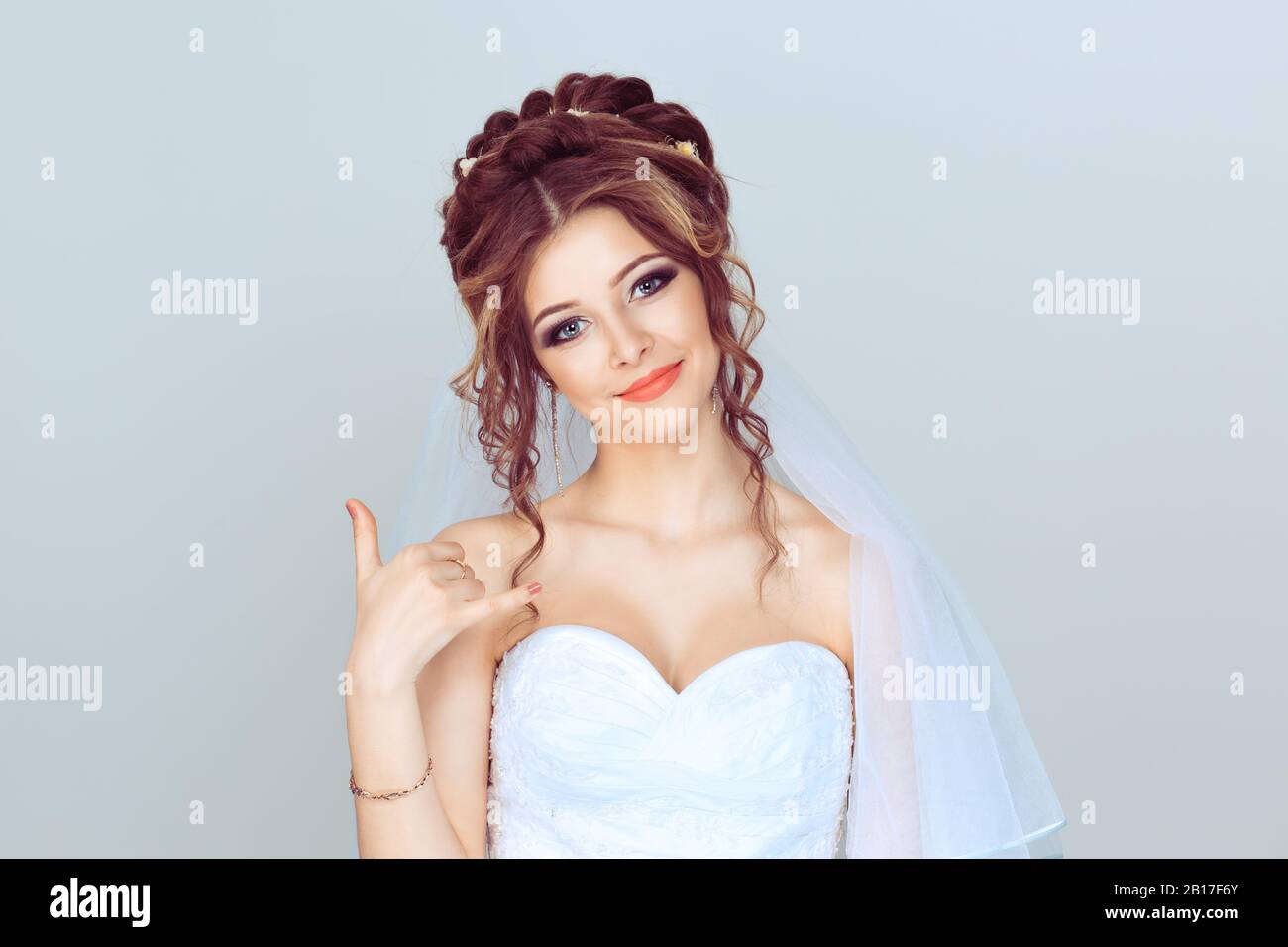 Call me. Beautiful bride, woman girl showing call me hand gesture on my ...
