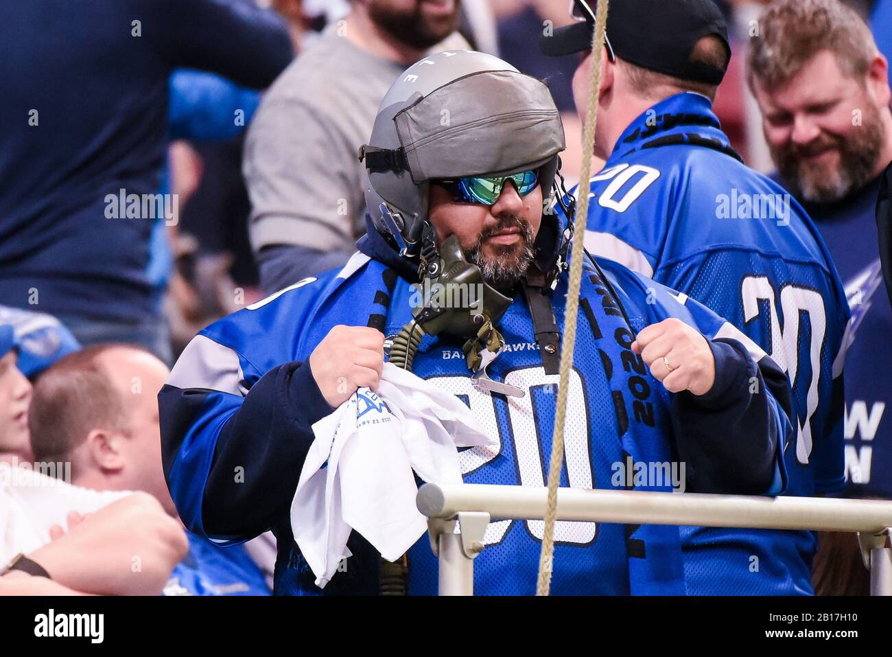 Feb 23, 2020: A fan dresses up in a combat pilot's helmet for the ready ...