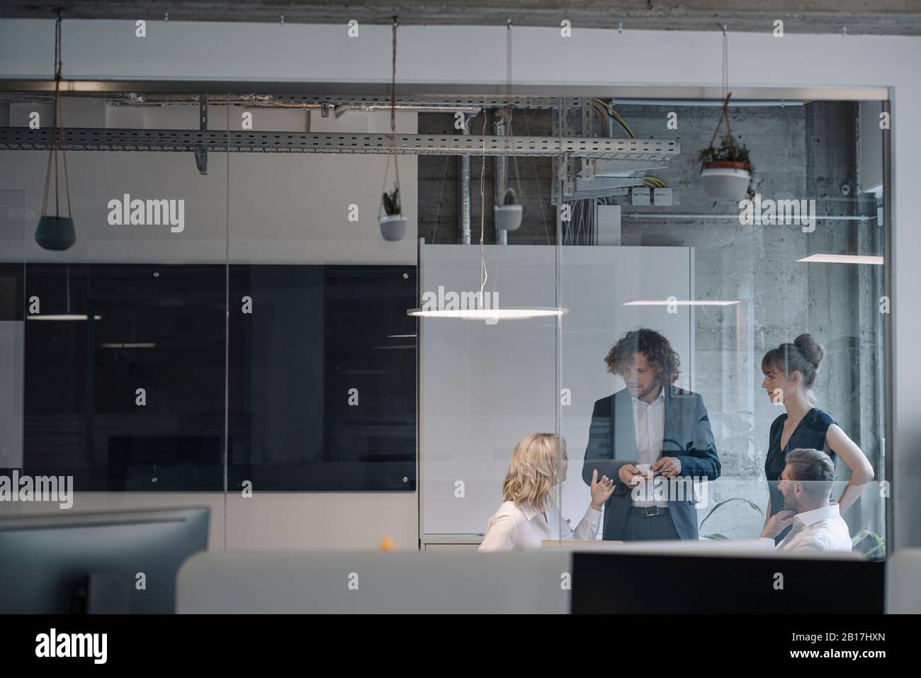Business team having a meeting in office Stock Photo - Alamy
