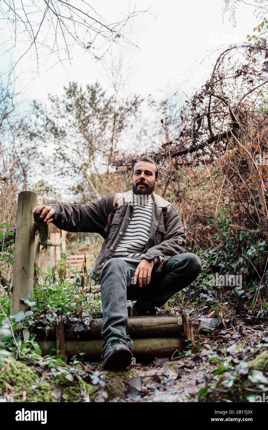 Young man exploring nature, portrait Stock Photo - Alamy