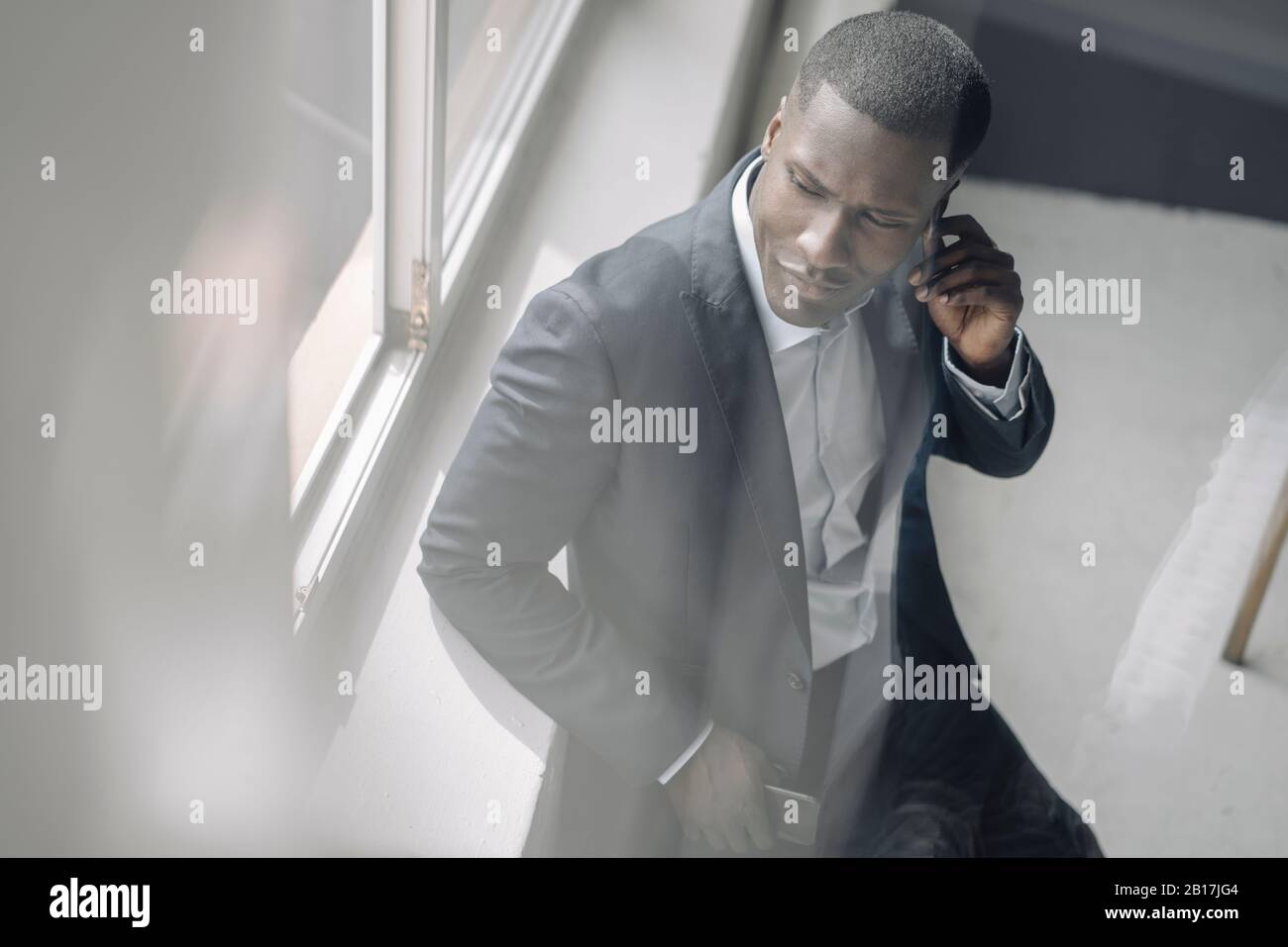 Leaning on windowsill hi-res stock photography and images - Alamy