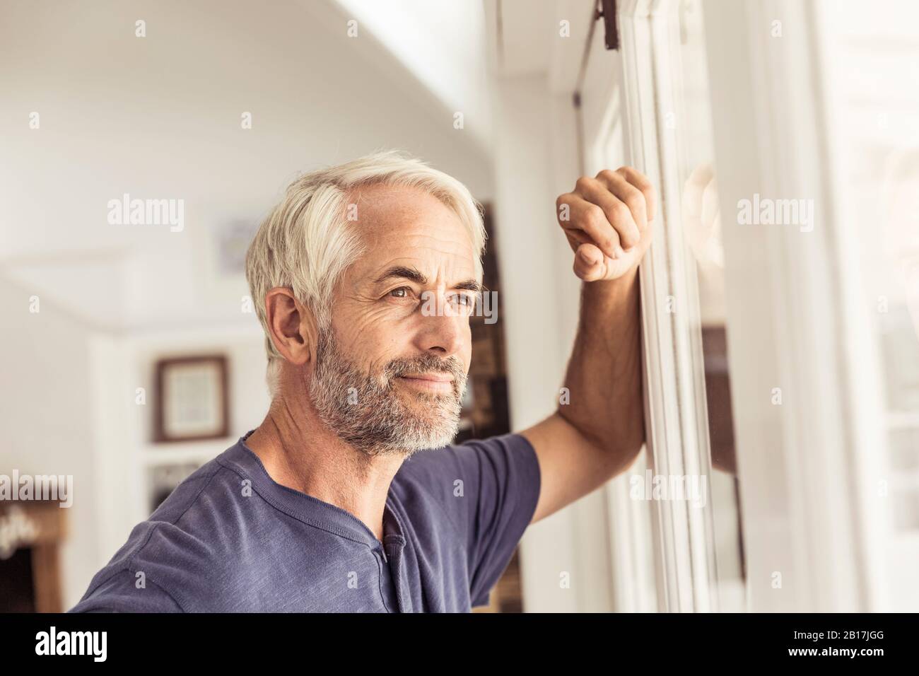 Man looking out hi-res stock photography and images - Alamy