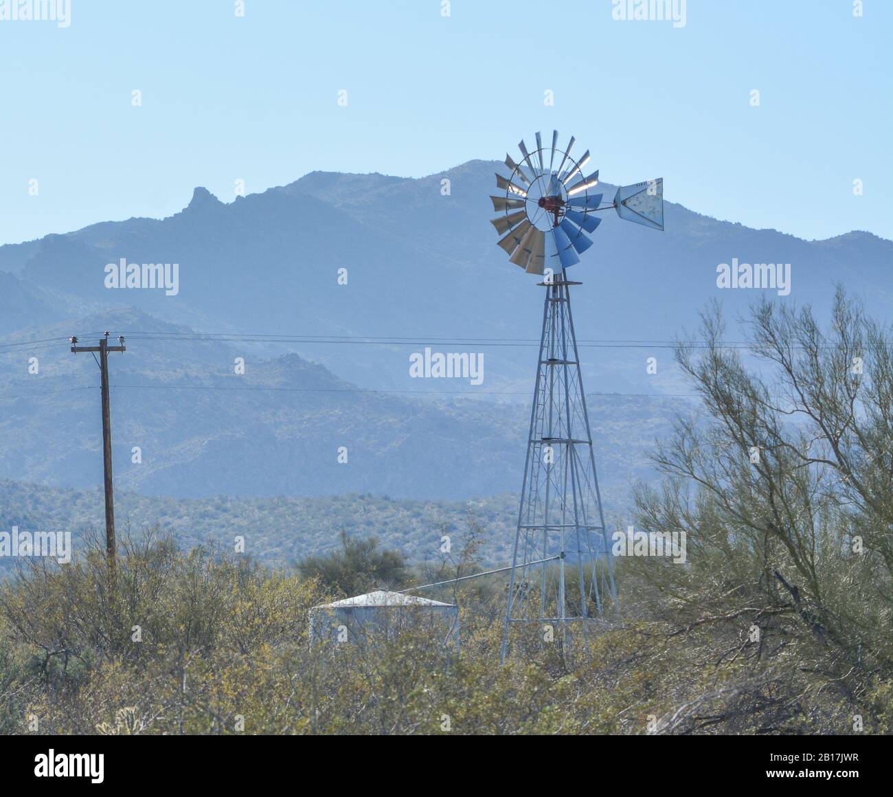 Windmill pumping water to the water tank in Mohave County, Sonoran ...