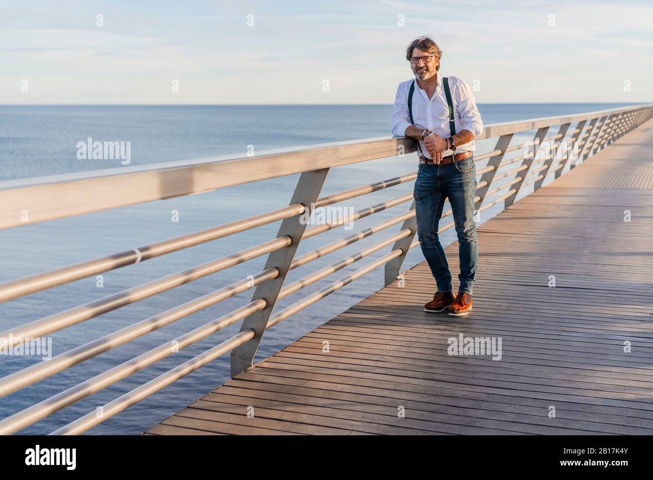 Male lean railing hi-res stock photography and images - Alamy