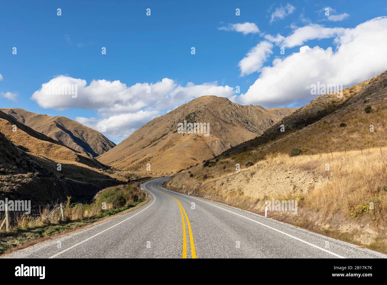 New Zealand, Clouds over empty State Highway 8 in Lindis Pass Stock ...