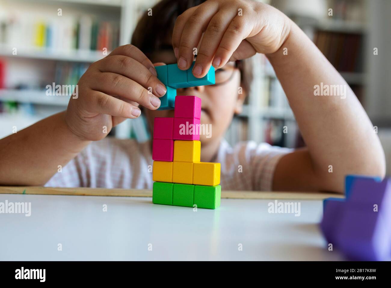 Boy playing blocks coloured hi-res stock photography and images - Alamy
