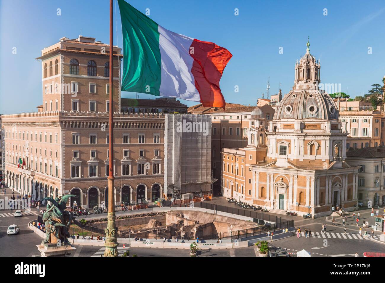 Italy, Rome, Italian flag fluttering against Palazzo Bonaparte and ...