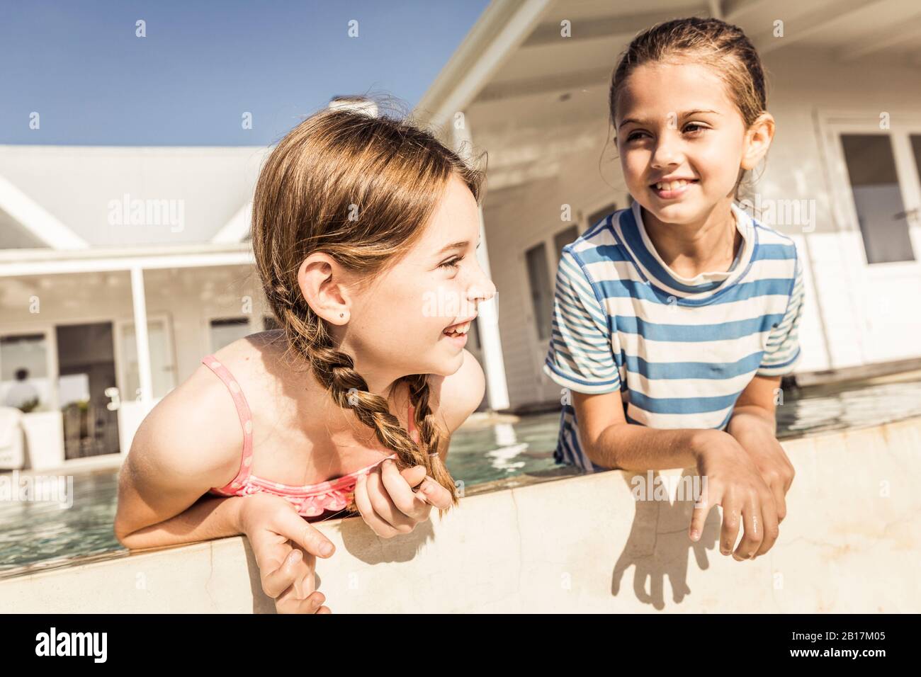Two girls swimming hi-res stock photography and images - Alamy