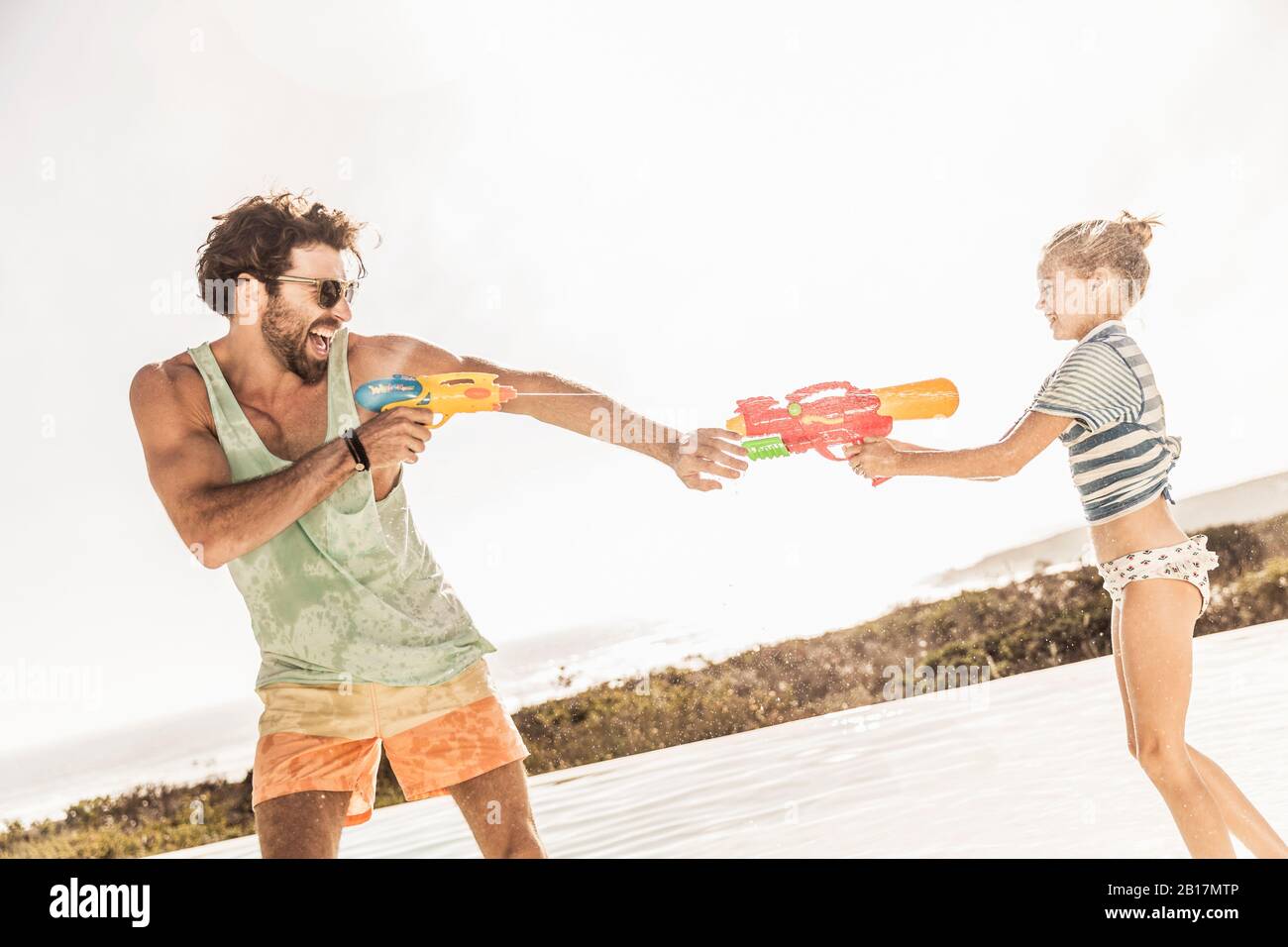 Girl water fight hi-res stock photography and images - Alamy