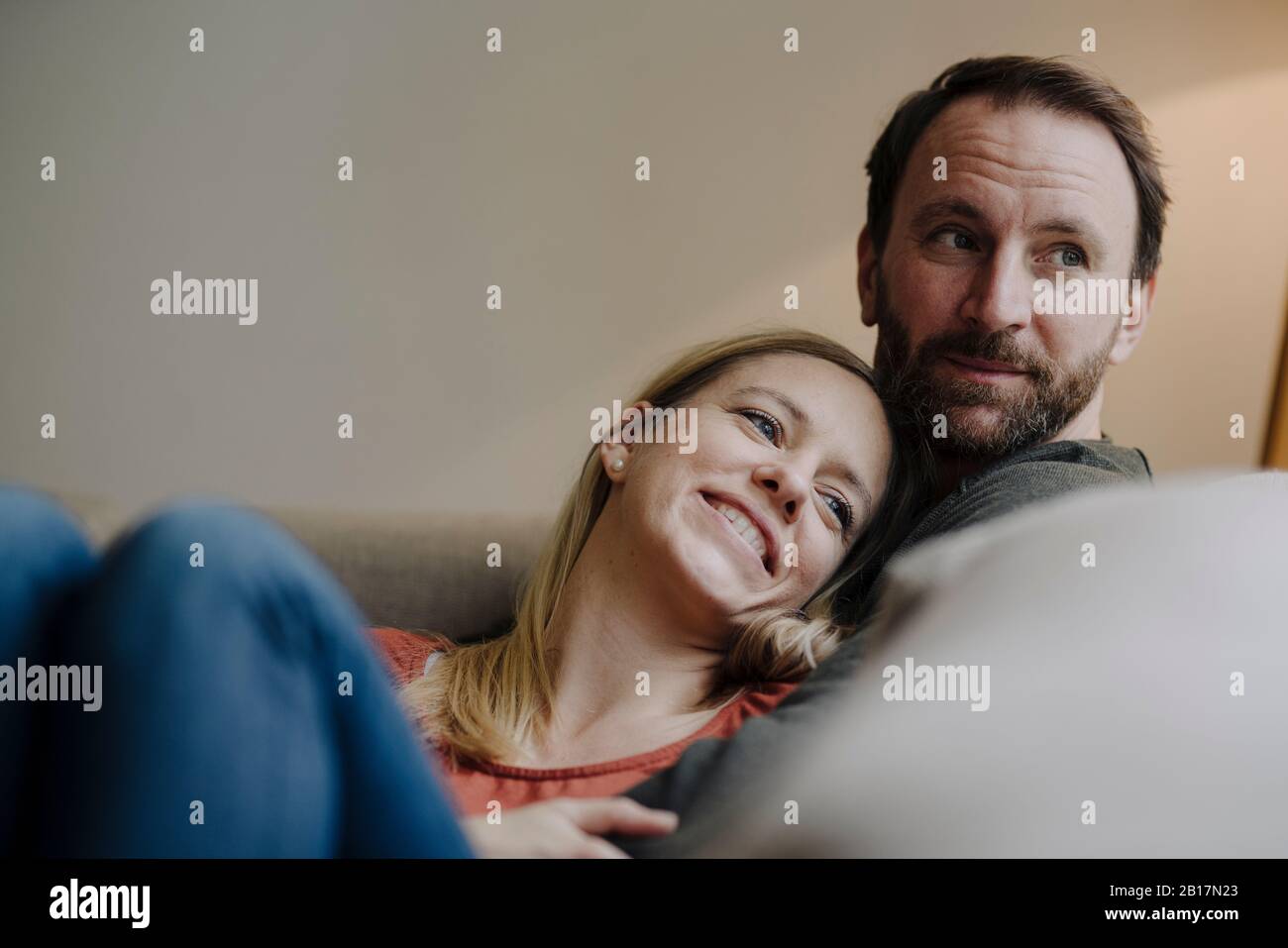 Couple romancing home hi-res stock photography and images - Alamy