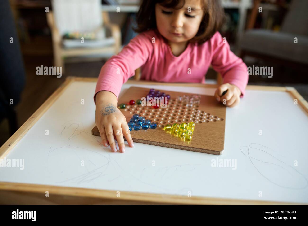 Playing marbles hi-res stock photography and images - Alamy
