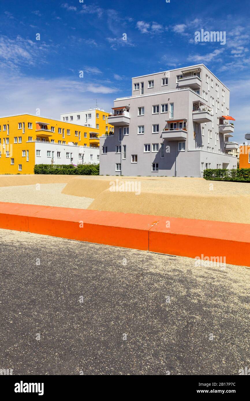 Sandy playground front residential buildings hi-res stock photography ...