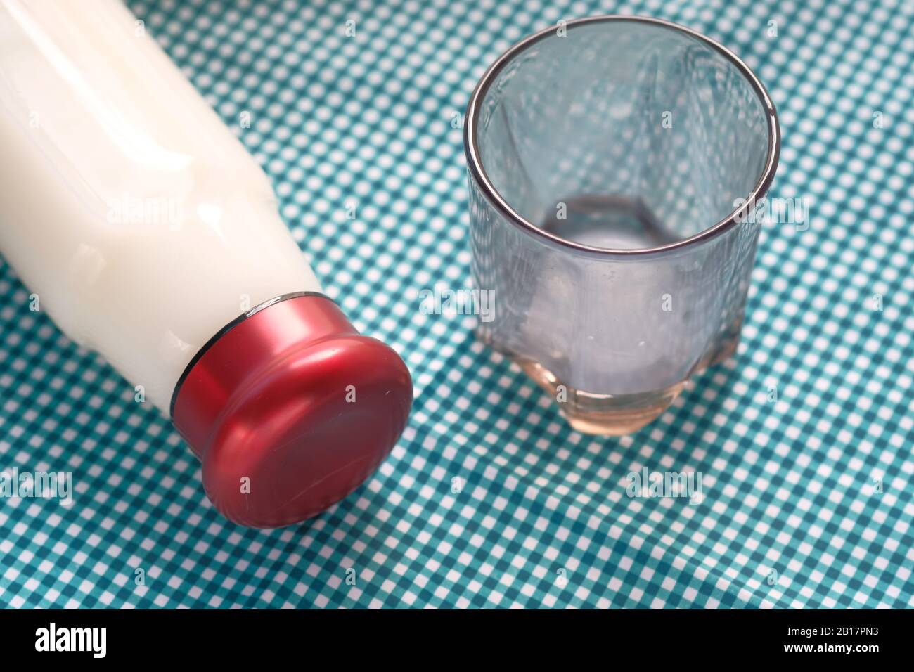 Empty glass milk bottle hi-res stock photography and images - Alamy