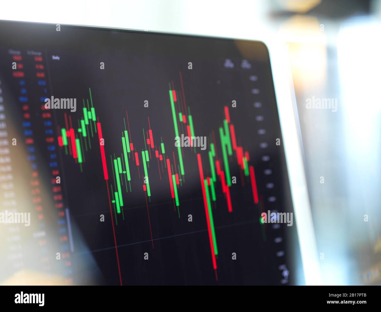 Computer monitor with graph Stock Photo - Alamy