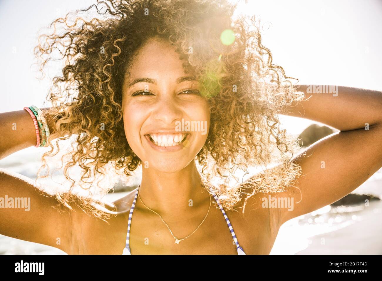 Woman face portrait beach bikini hi-res stock photography and images ...