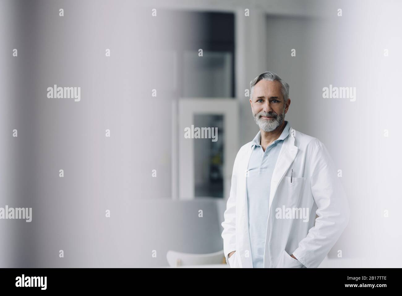 Portrait of smiling doctor Stock Photo - Alamy