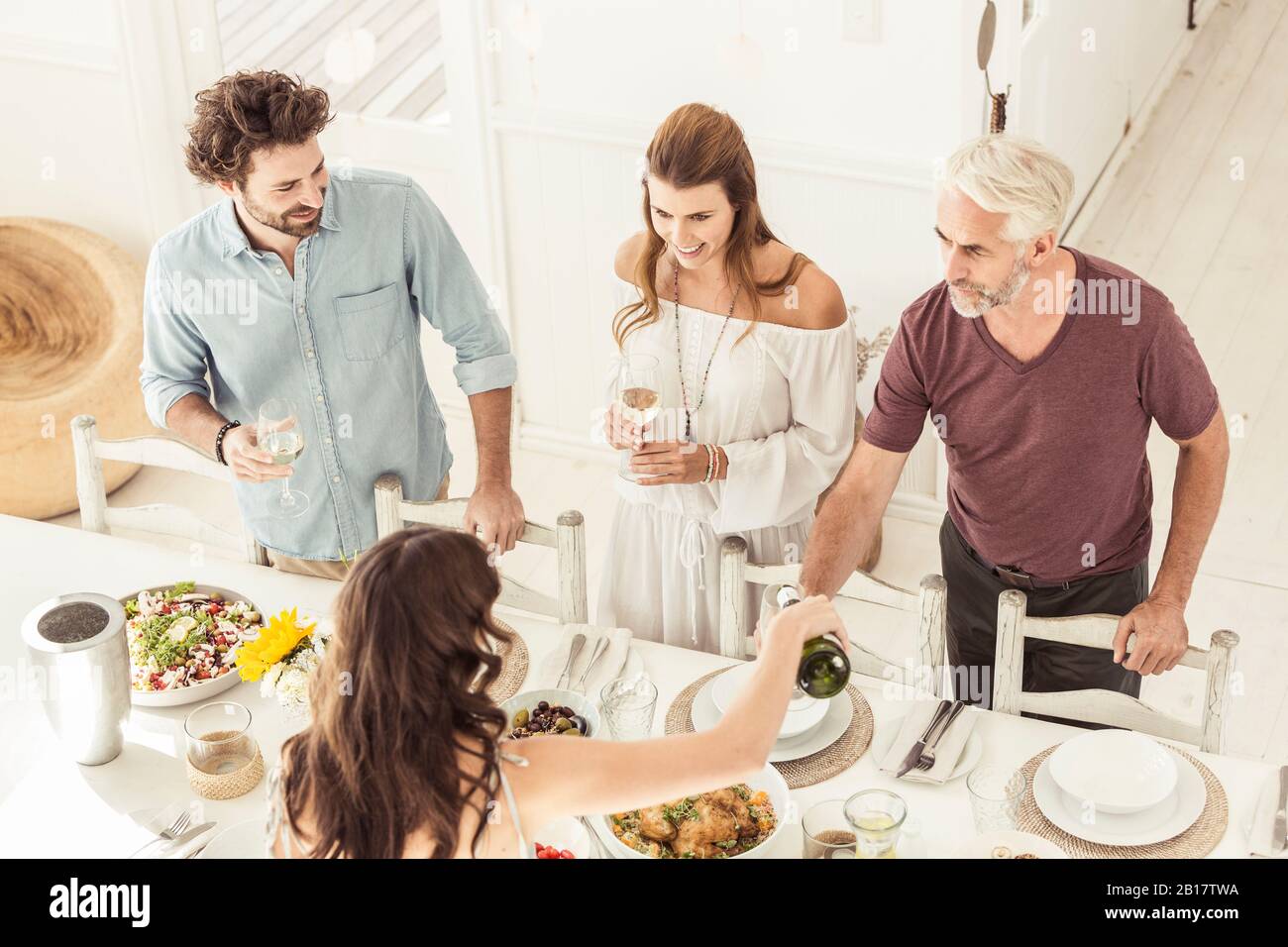 Family and friends having lunch together Stock Photo - Alamy