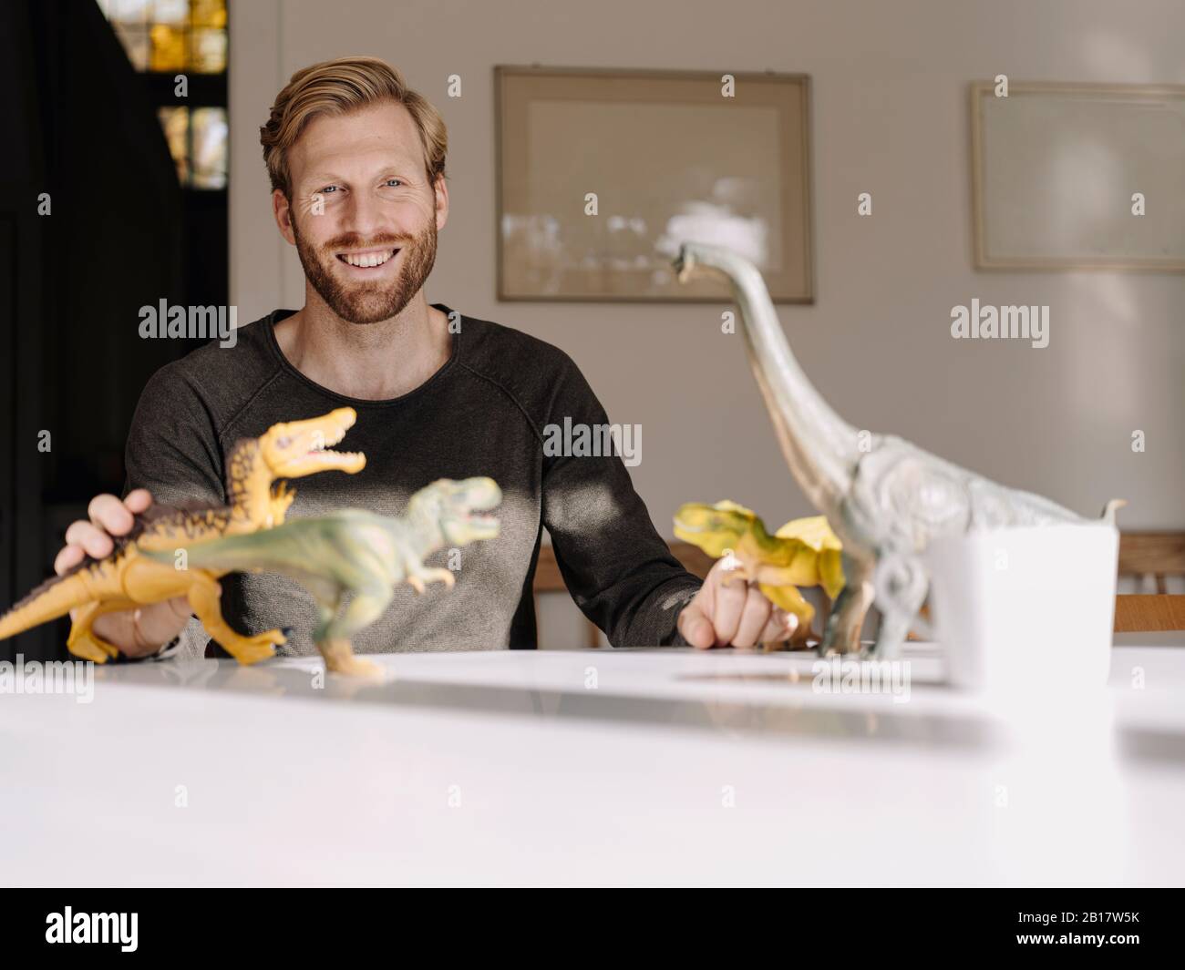 Dinosaurs on building hi-res stock photography and images - Alamy