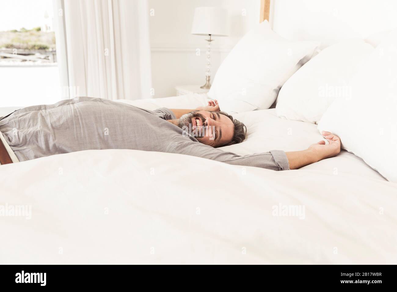 Bearded man bed hi-res stock photography and images - Alamy