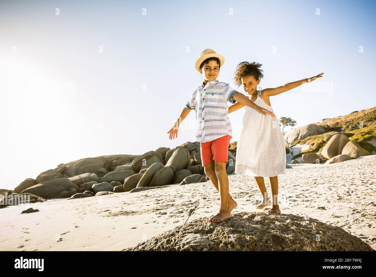 Boy on a rock hi-res stock photography and images - Alamy