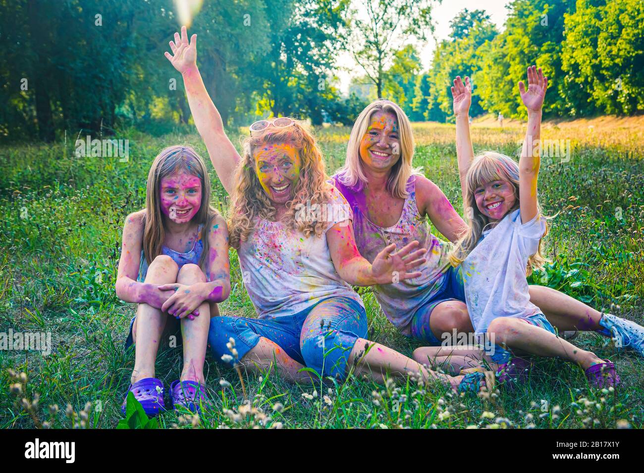 Group picture of two women and two girls celebrating Festival of ...