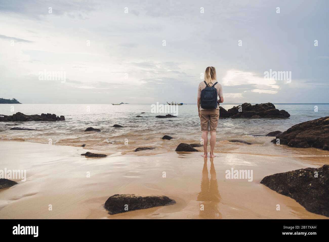 Rear view woman beach nai thon beach hi-res stock photography and ...