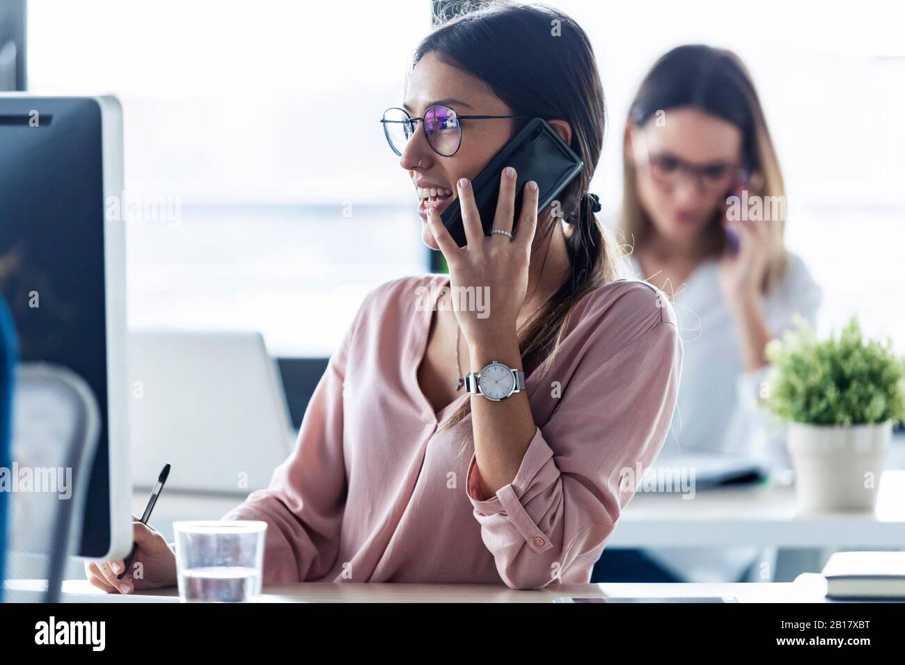 Phoning while hi-res stock photography and images - Alamy