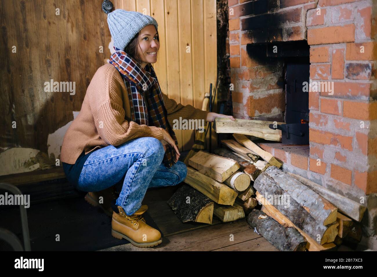 Open fire woman home hi-res stock photography and images - Alamy