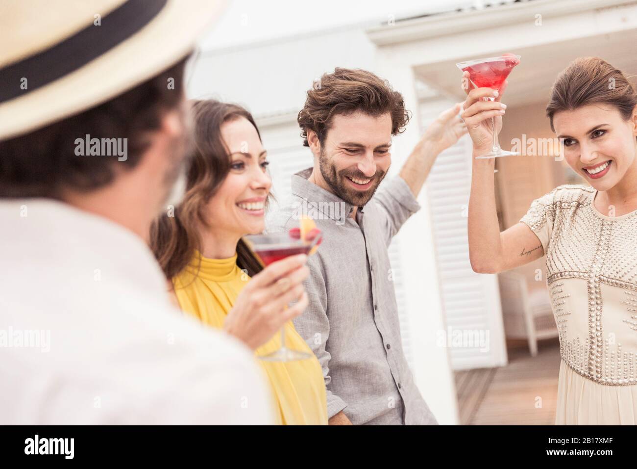 Couple cocktail party hi-res stock photography and images - Alamy