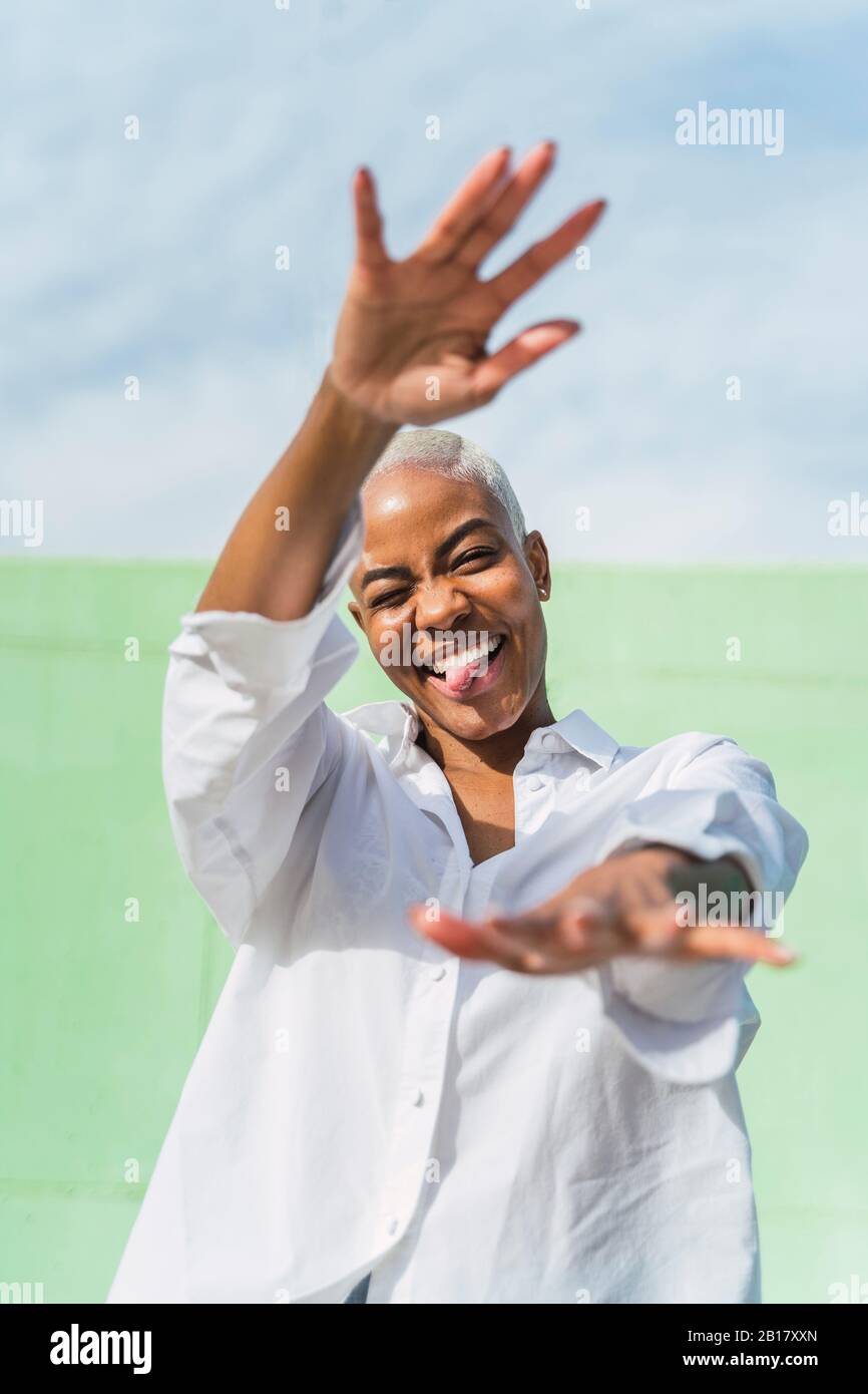 Hapy woman, laughing and dancing Stock Photo - Alamy