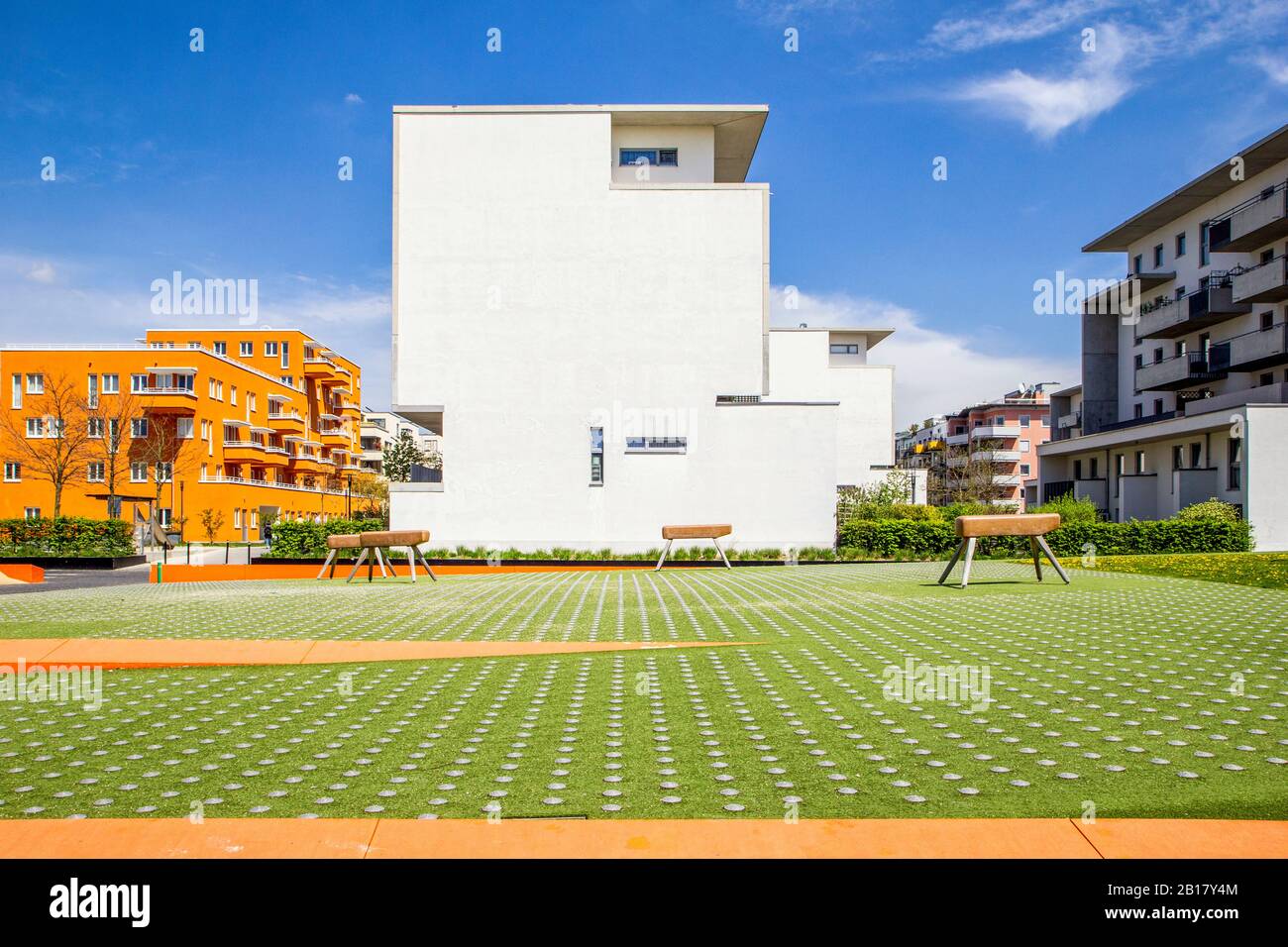 Germany, Bavaria, Munich, Playground with gymnastics vaults in front of ...