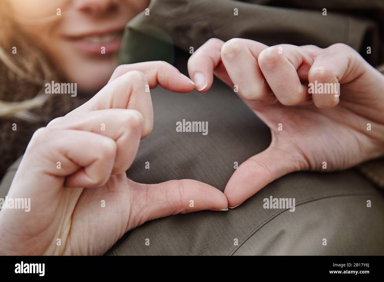 Couple heart hands close up hi-res stock photography and images - Alamy