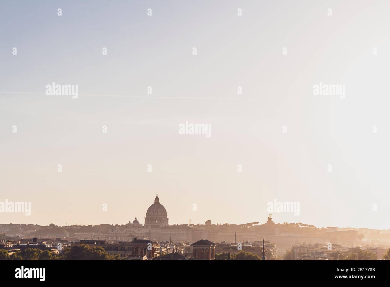 Italy, Rome, Clear sky over skyline of capital city at sunset Stock ...