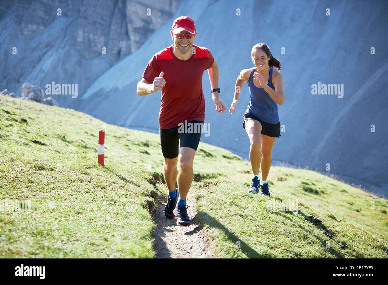 2 persons running in track hi-res stock photography and images - Alamy