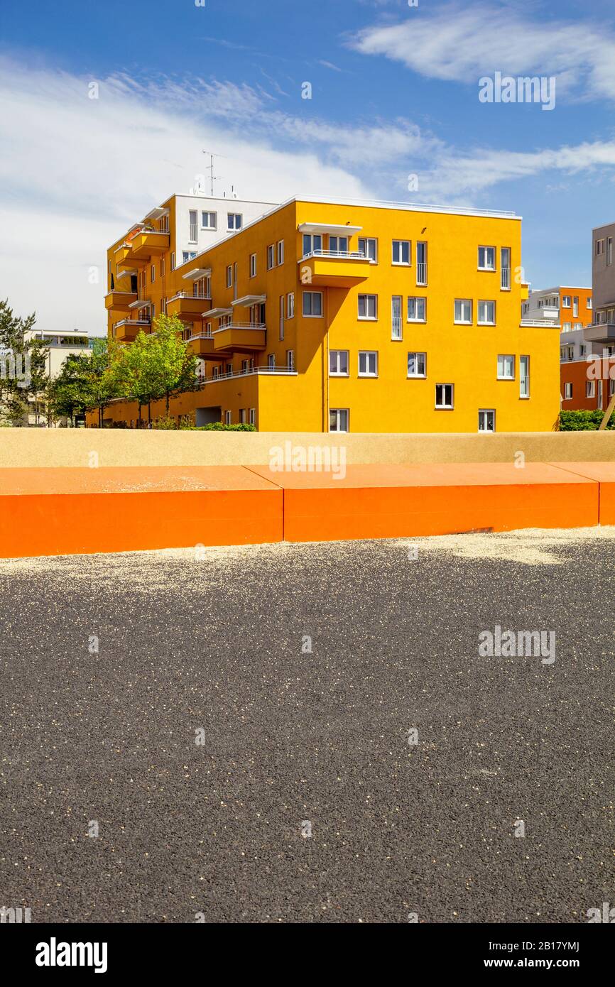 Yellow painted residential building theresienpark hi-res stock ...