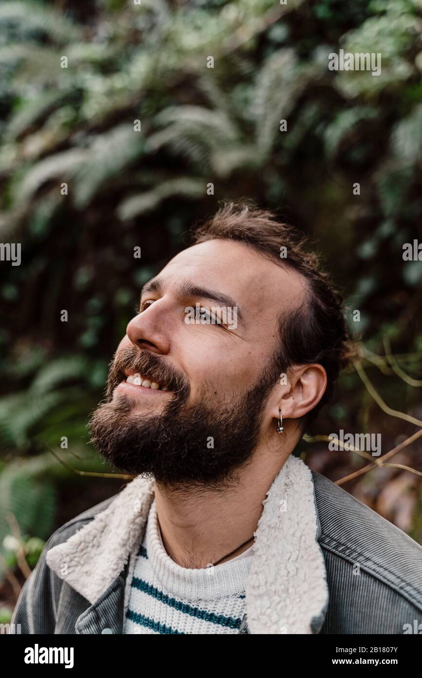 Cool smiling young man hi-res stock photography and images - Alamy