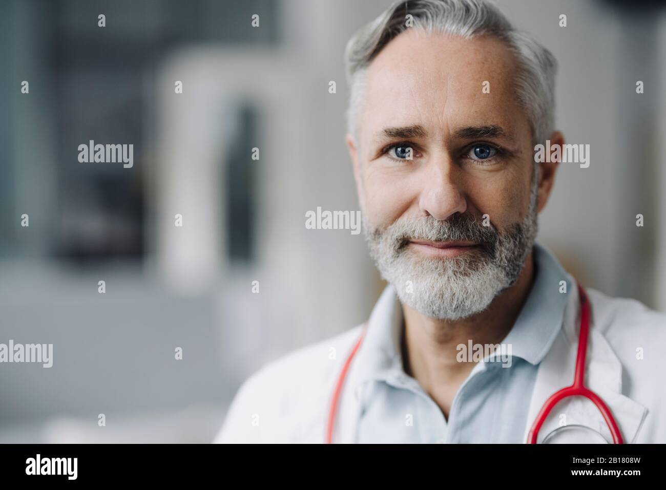 Portrait of mature doctor with Stock Photo - Alamy