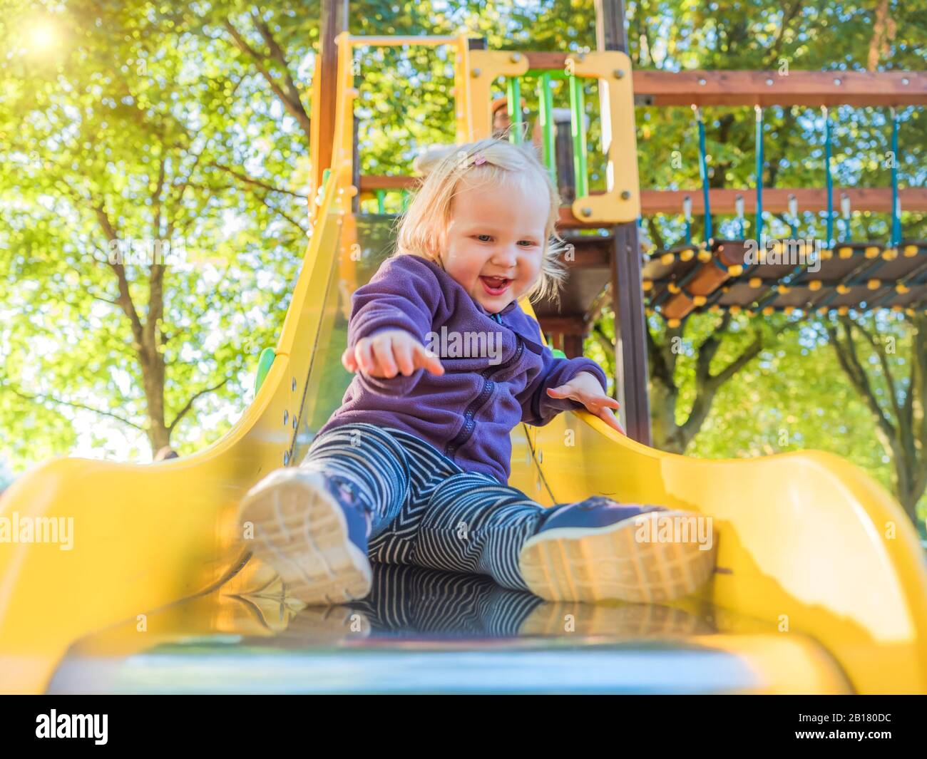 Girl slide hi-res stock photography and images - Alamy