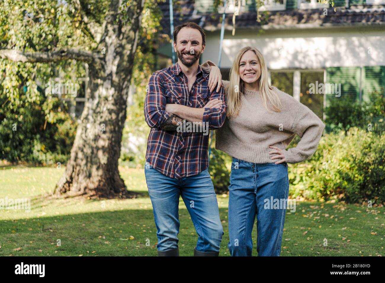 Two couples standing in home hi-res stock photography and images - Alamy