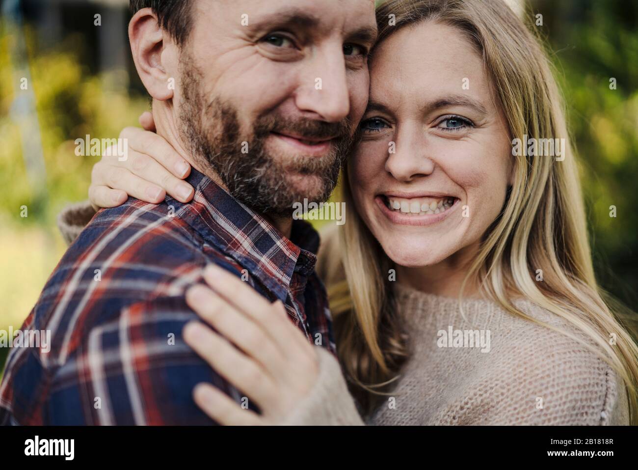 Natural photo of couple embracing hi-res stock photography and images ...